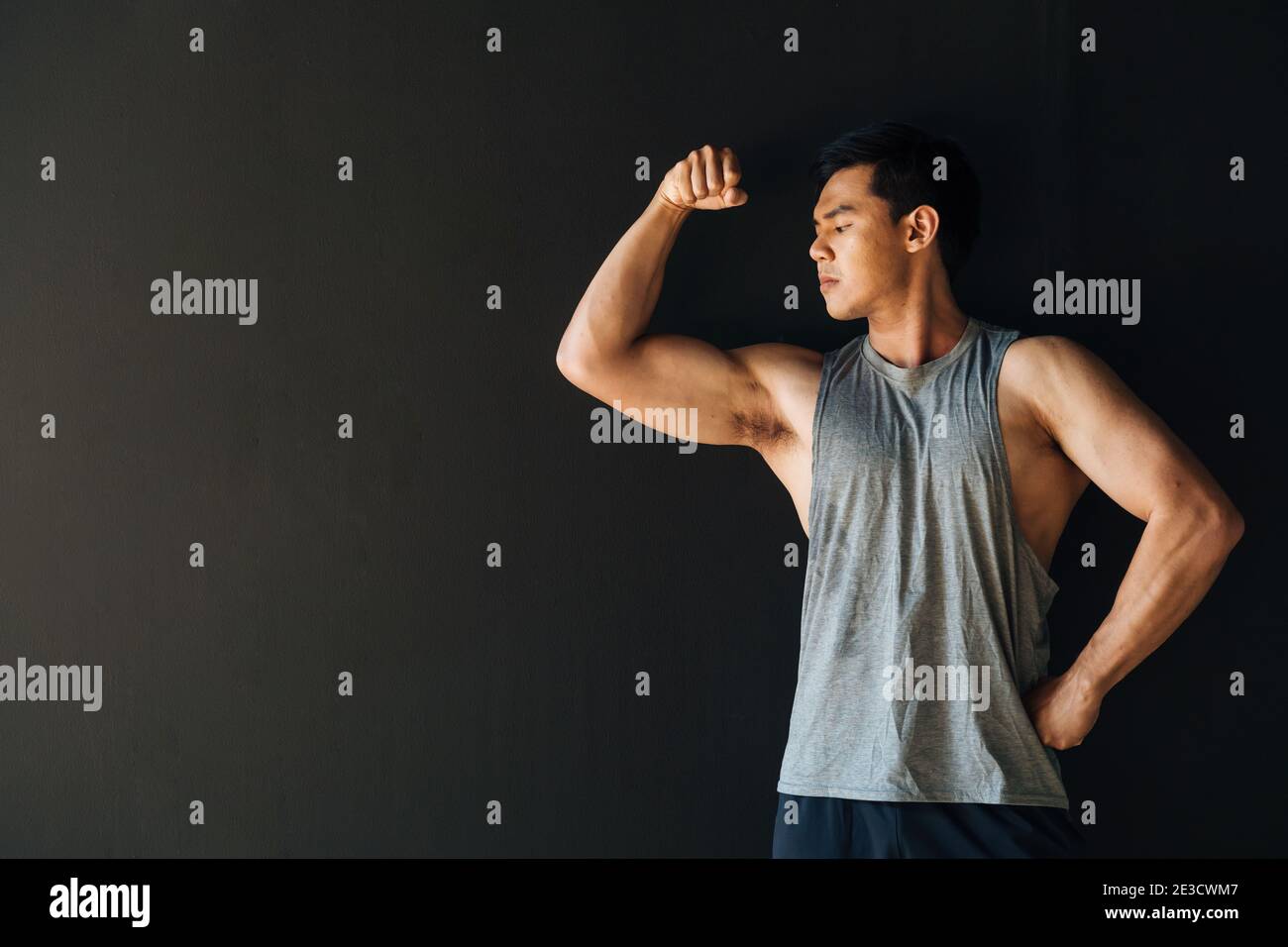 Bodybuilder pose bicep on arm hi-res stock photography and images - Alamy