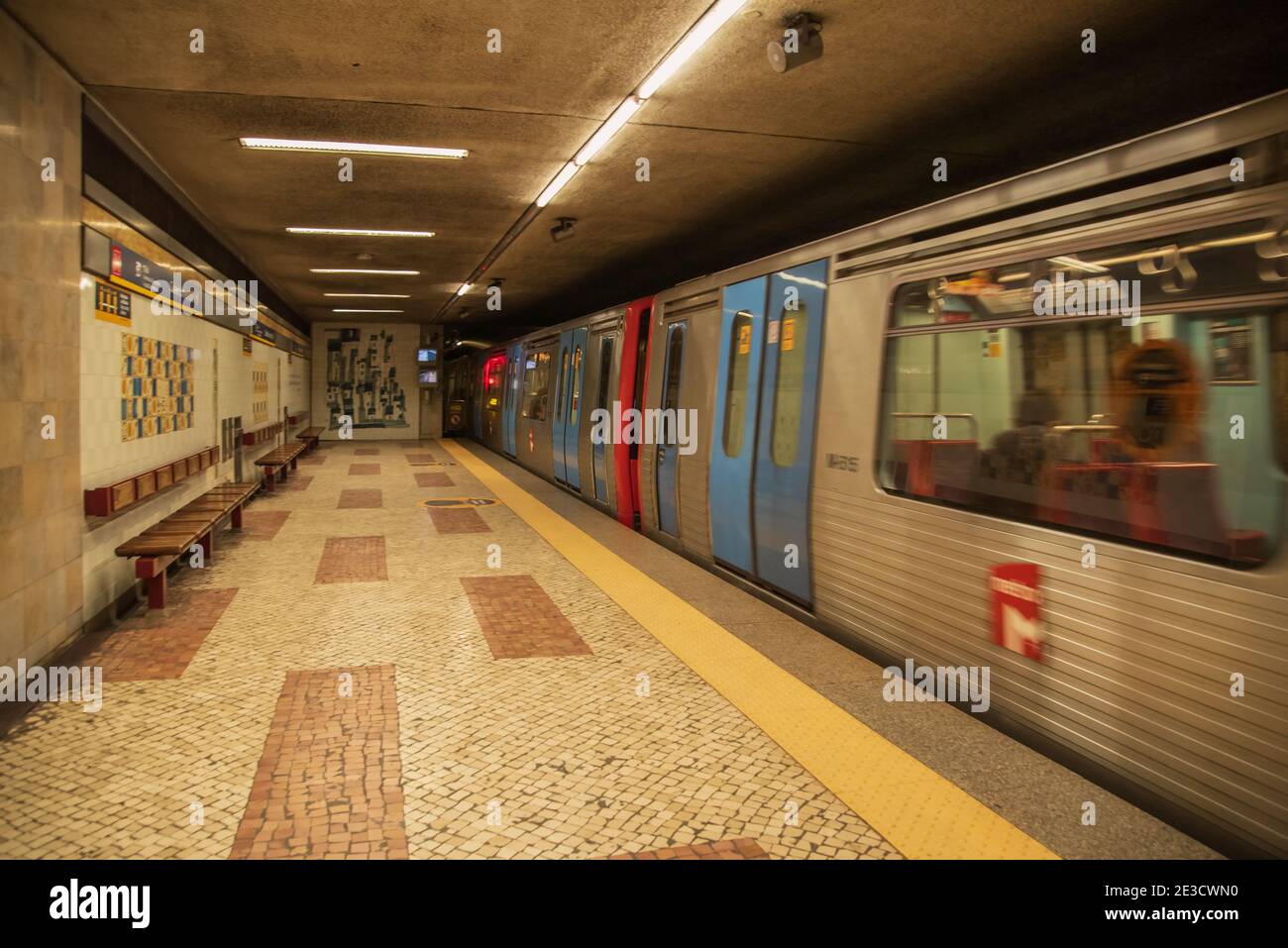 Empty Metro train entering an underground station in Lisbon, Portugal ...