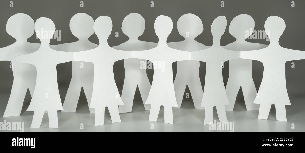 paper people shape cut, connection chain Stock Photo - Alamy