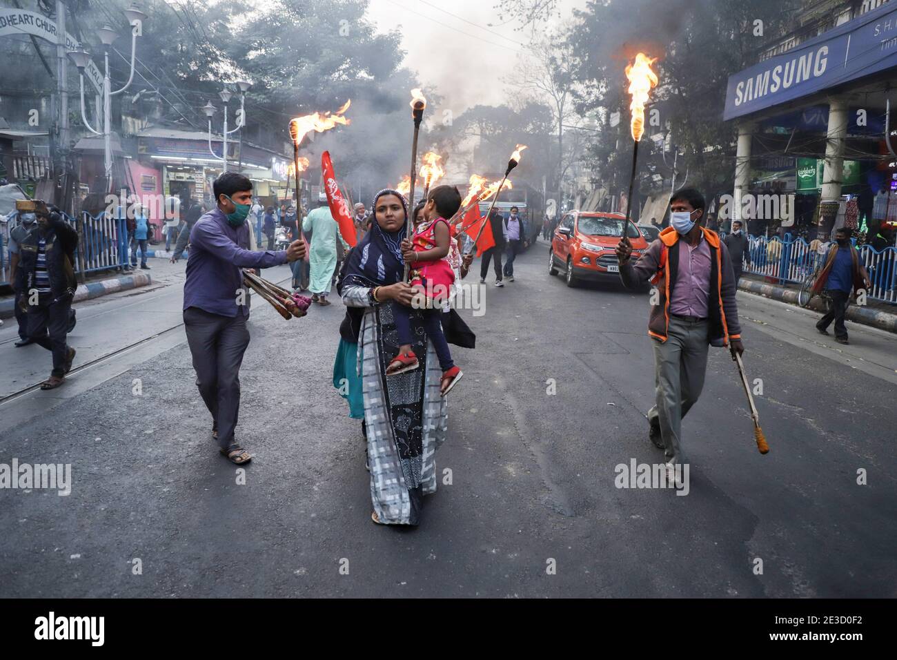 Kolkata, India. 18th Jan, 2021. A woman marching through the Streets ...