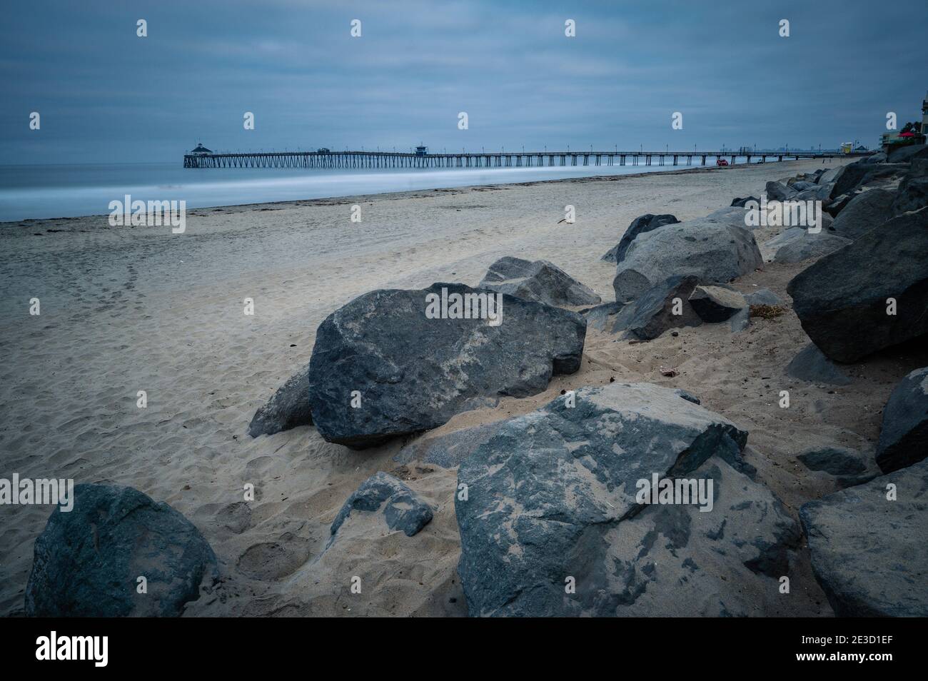 Imperial Beach pier with large rocks on beach Stock Photo - Alamy