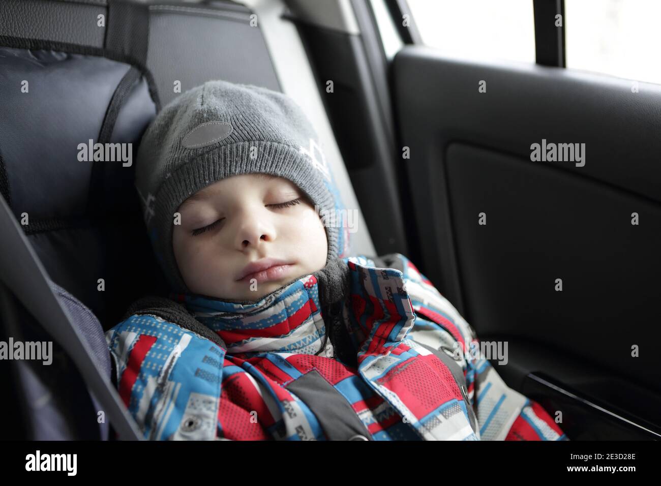 A kid boy sleeping in the car Stock Photo - Alamy