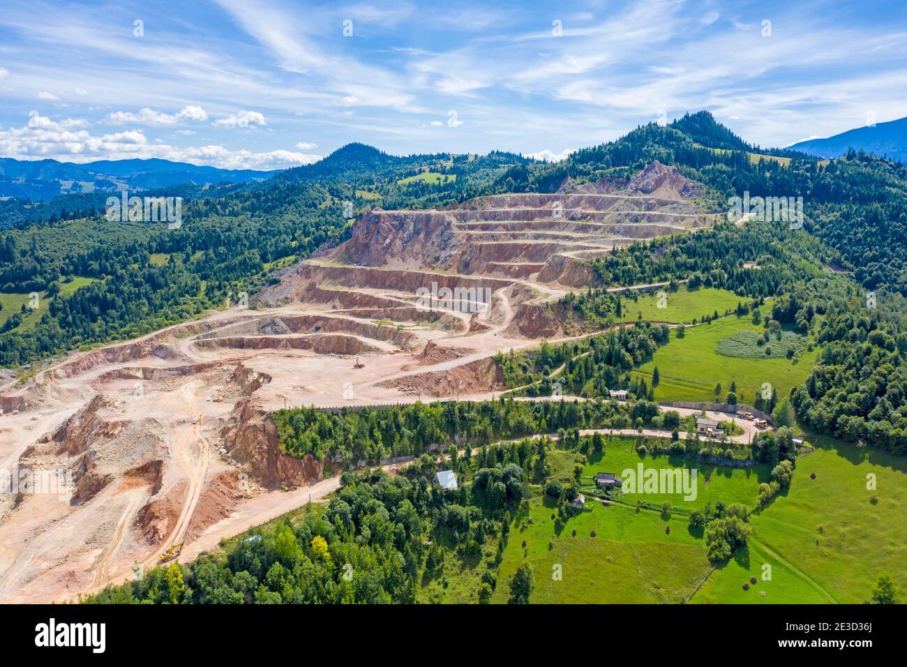 Aerial panorama of cement mining quarry in Romanian Carpahians during ...