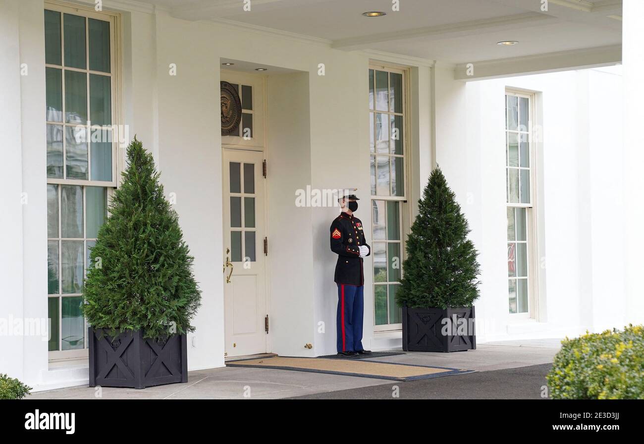 The entrance to the West Wing is seen with a Marine standing guard ...