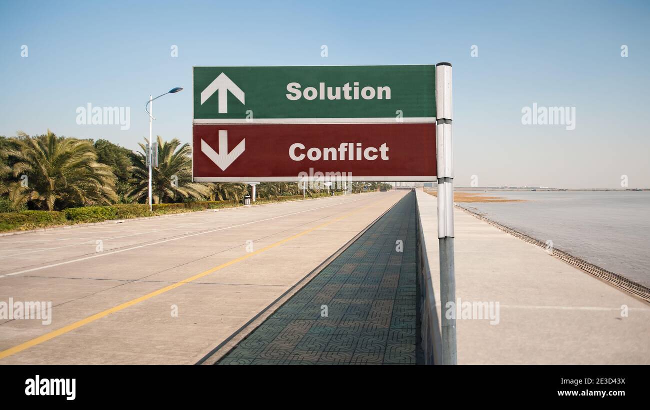 Street Sign the Direction Way to Solution versus Conflict Stock Photo ...