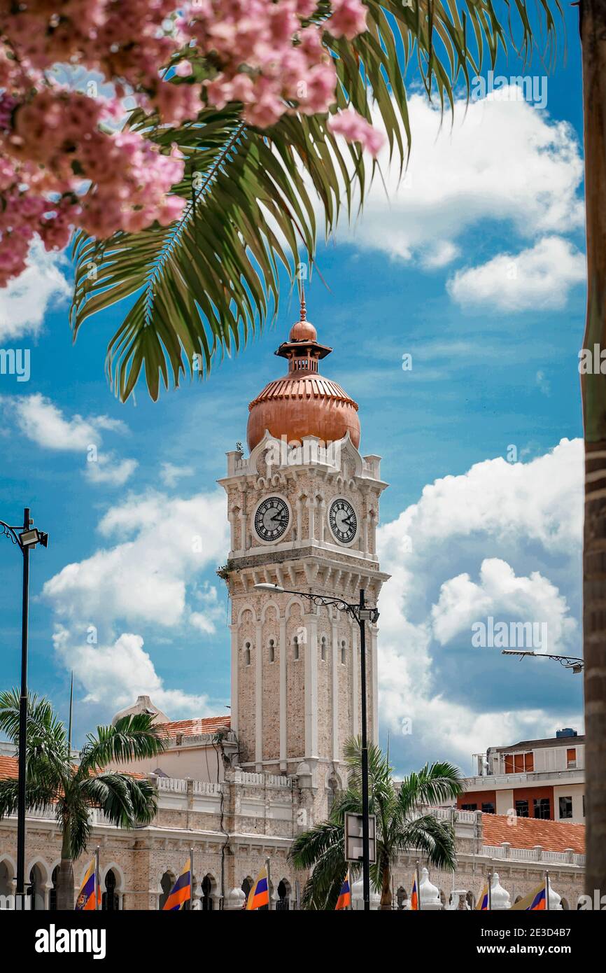 Vertical shot of the Sultan Abdul Samad Building under a blue cloudy ...