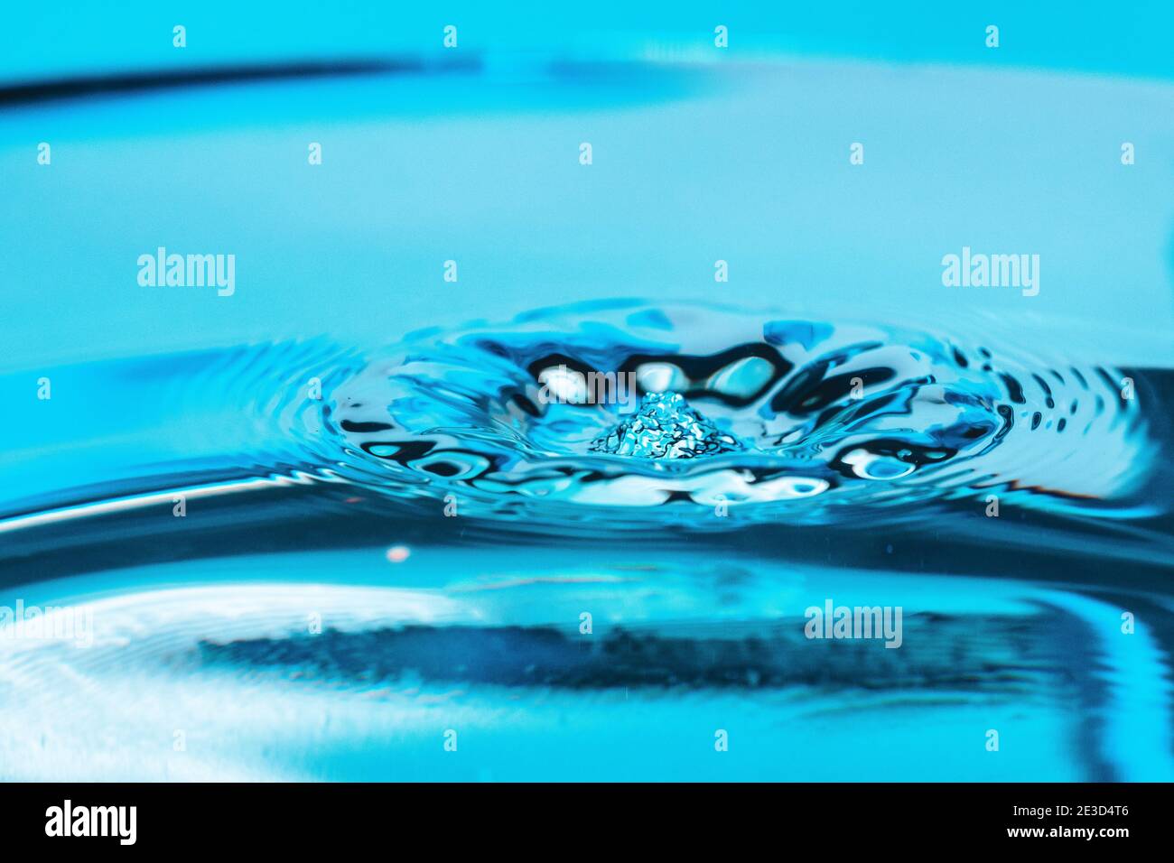 Water droplet bouncing on surface hi-res stock photography and images ...