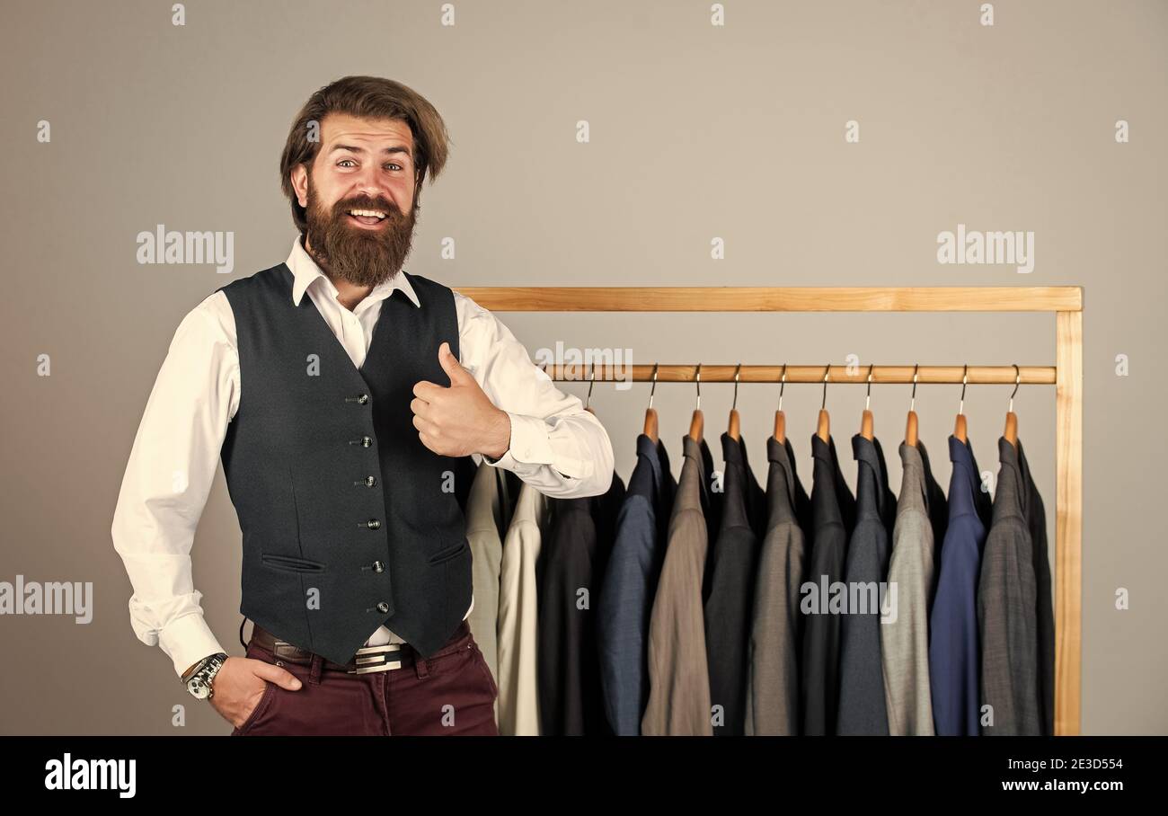 stylish business man at workspace. Fashion design studio. Male fashion ...
