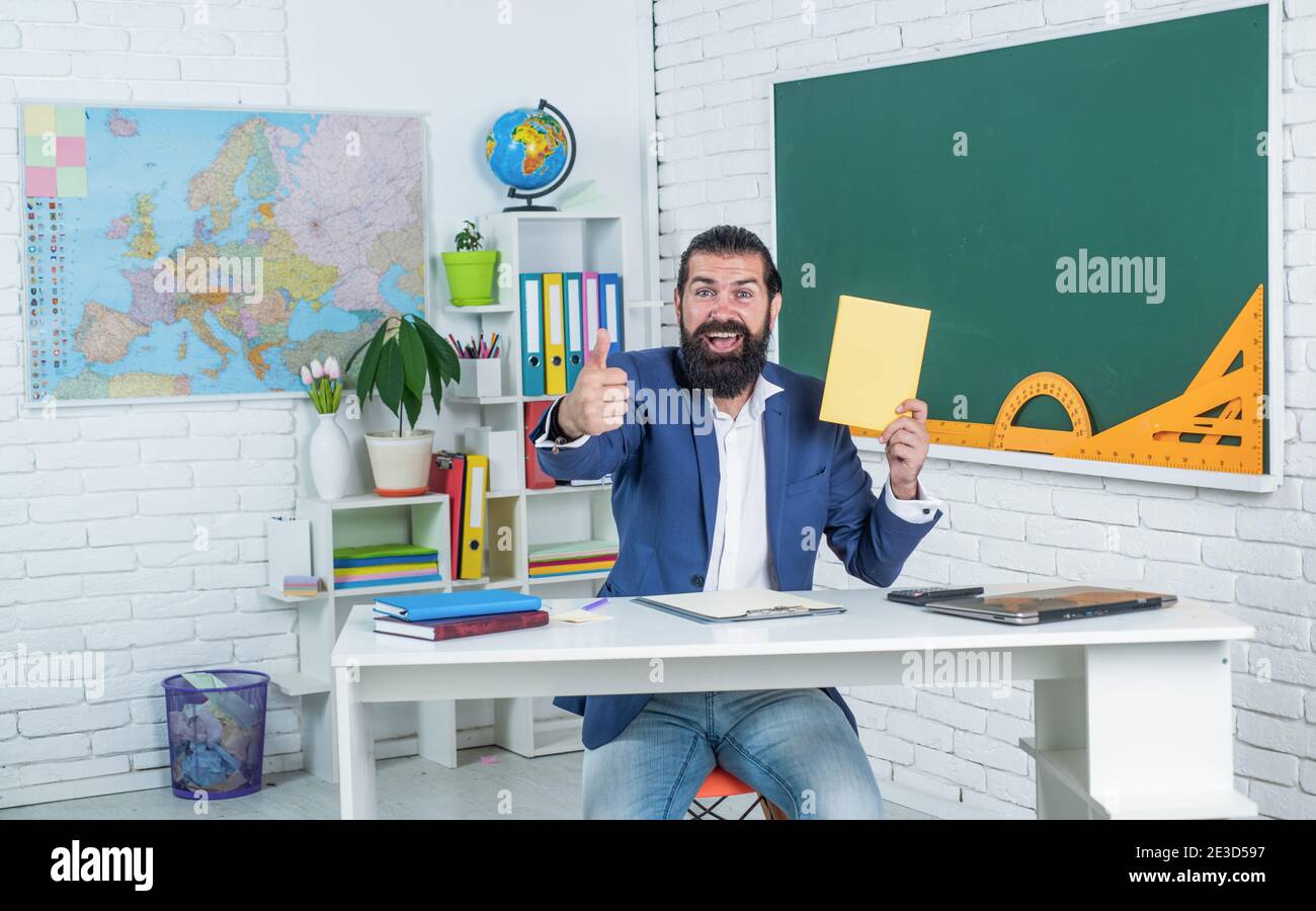 development. learning the subject. happy man with beard look at ...