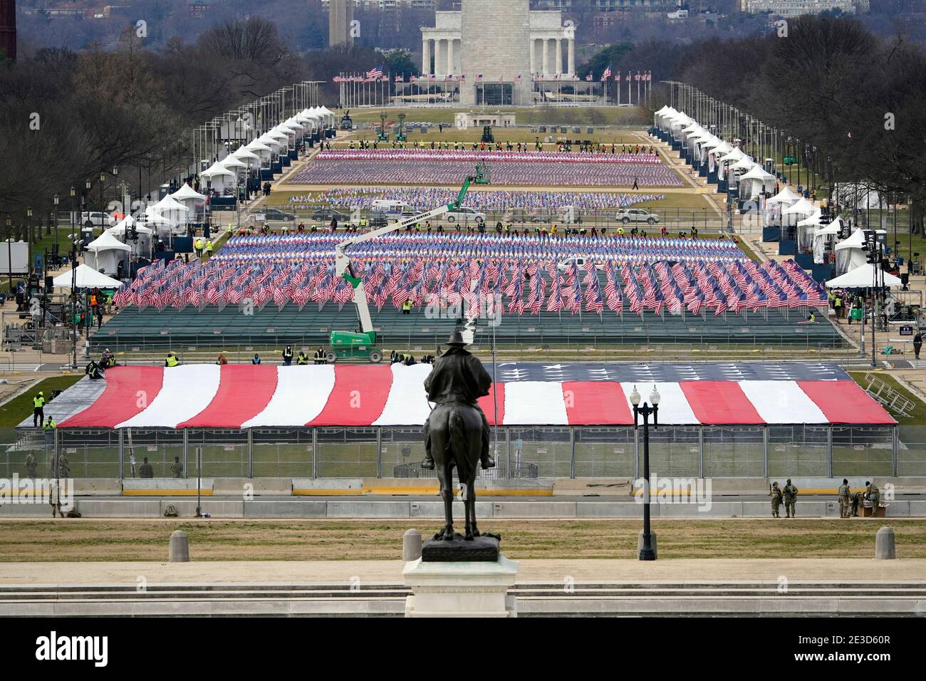 The National Mall is filled with a display of U.S. flags, as seen ...