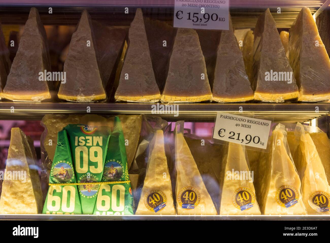 Cheese for sale in a cheese shop window in Bologna Italy including ...