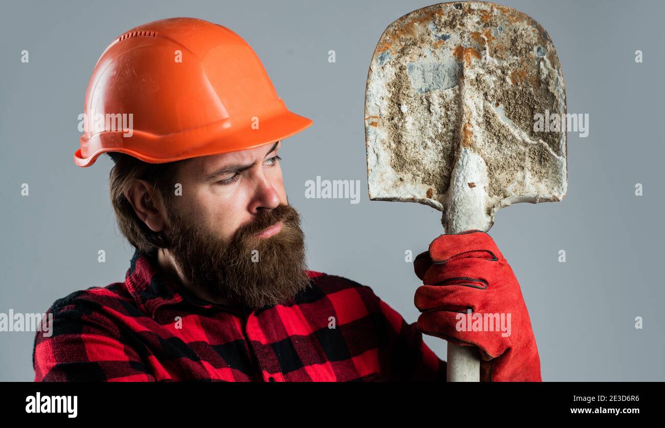Repair concept. brutal mature hipster wear checkered shirt and hard hat ...