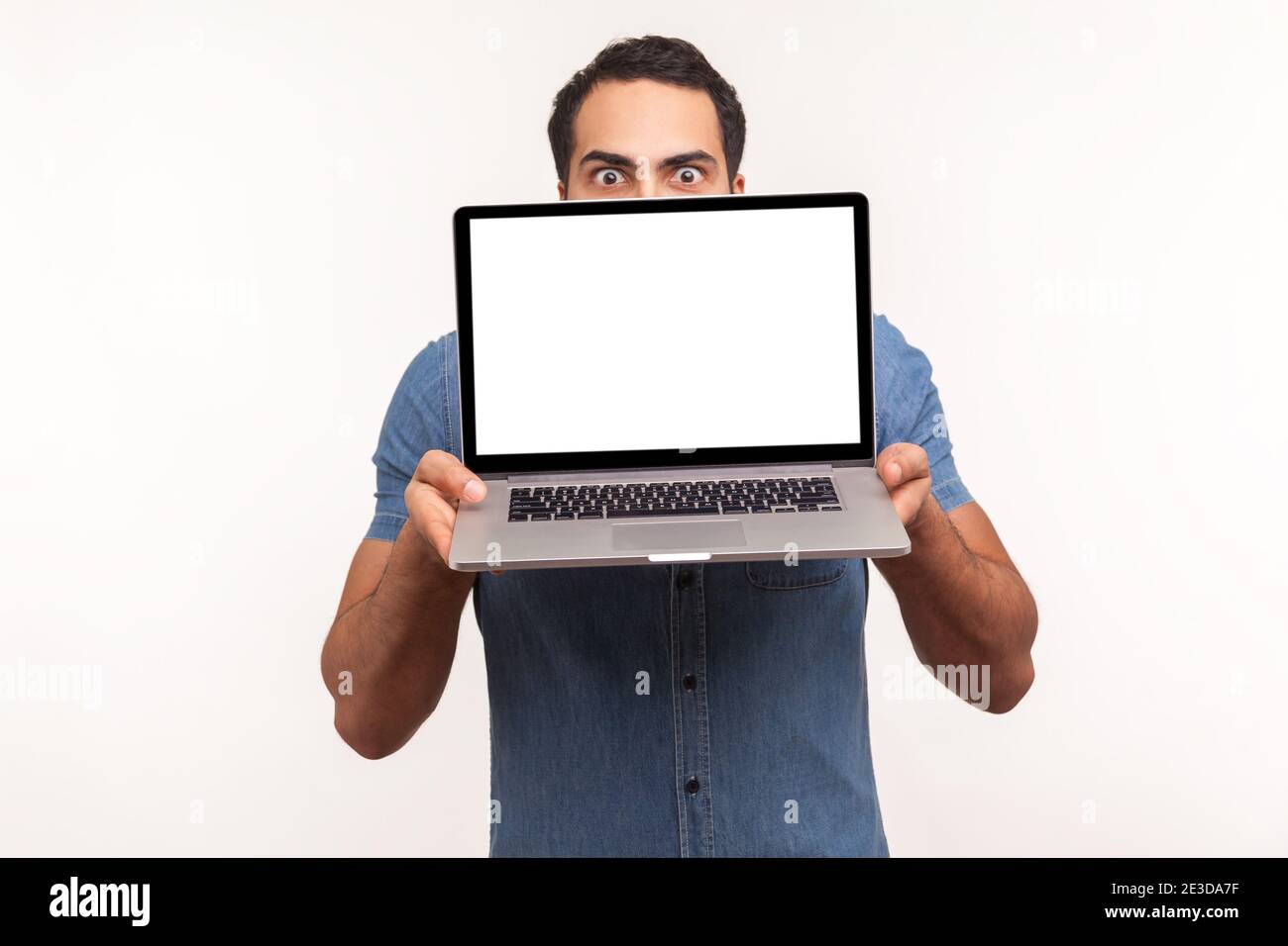 Man hiding behind computer hi-res stock photography and images - Alamy