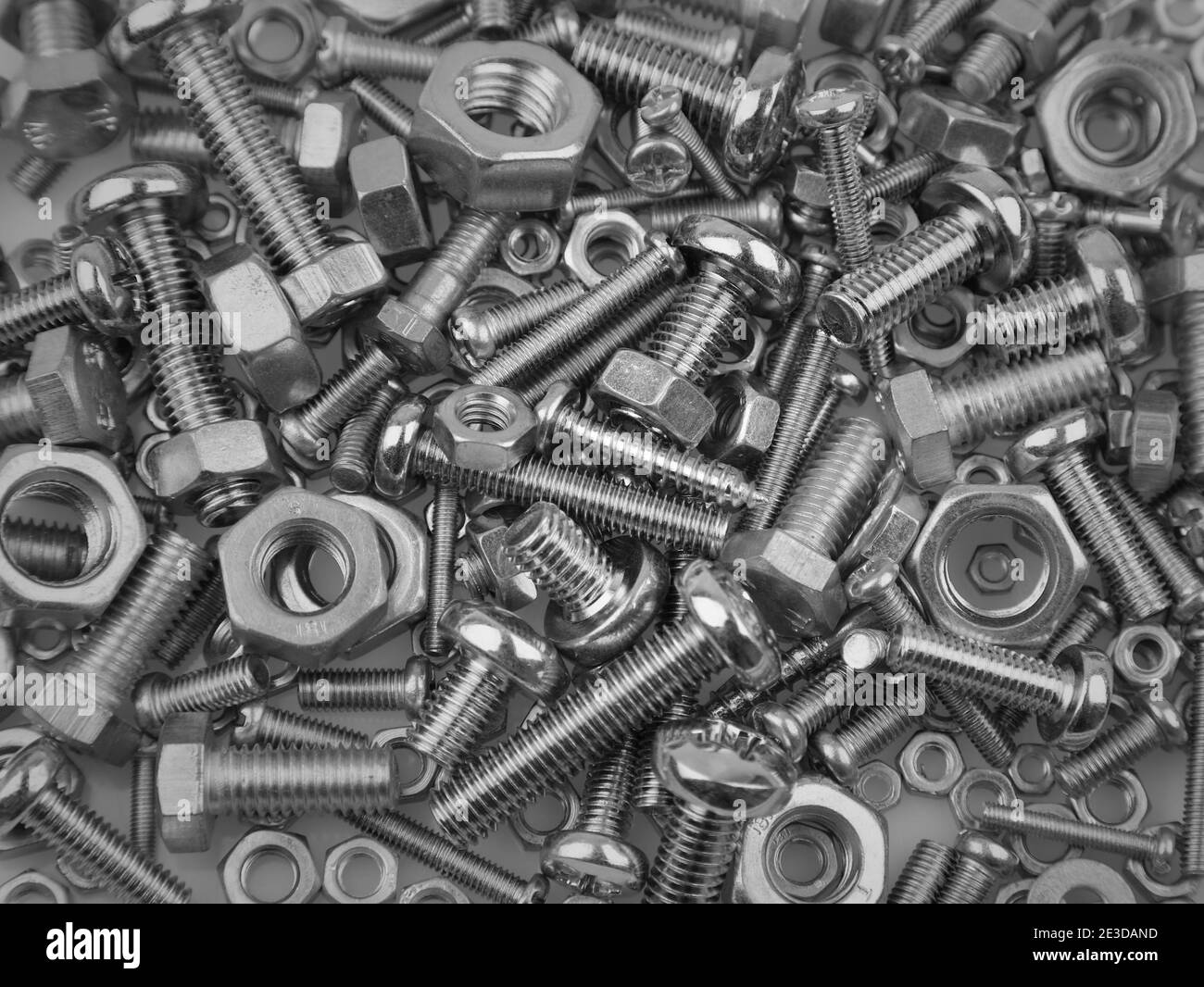 Chrome nuts and bolts close-up Stock Photo - Alamy