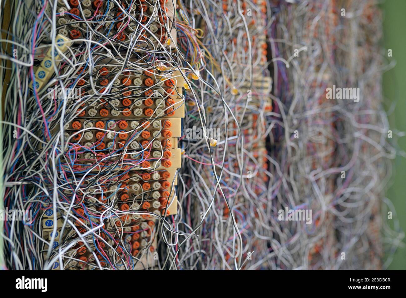Switchboard panel in datacenter with messy cables connections Stock ...