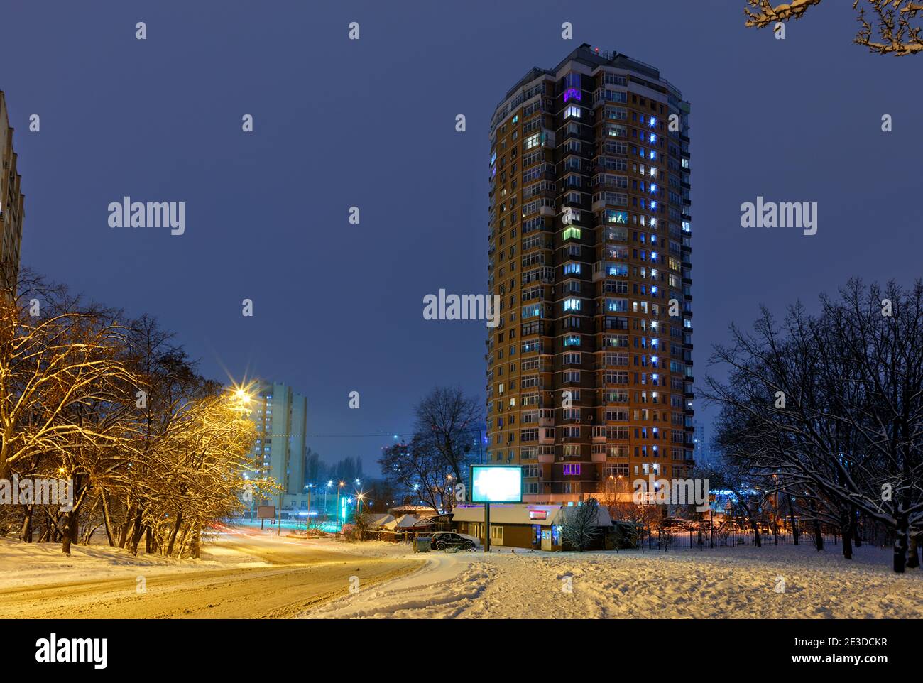 High-rise apartment building against the background of a city street in ...