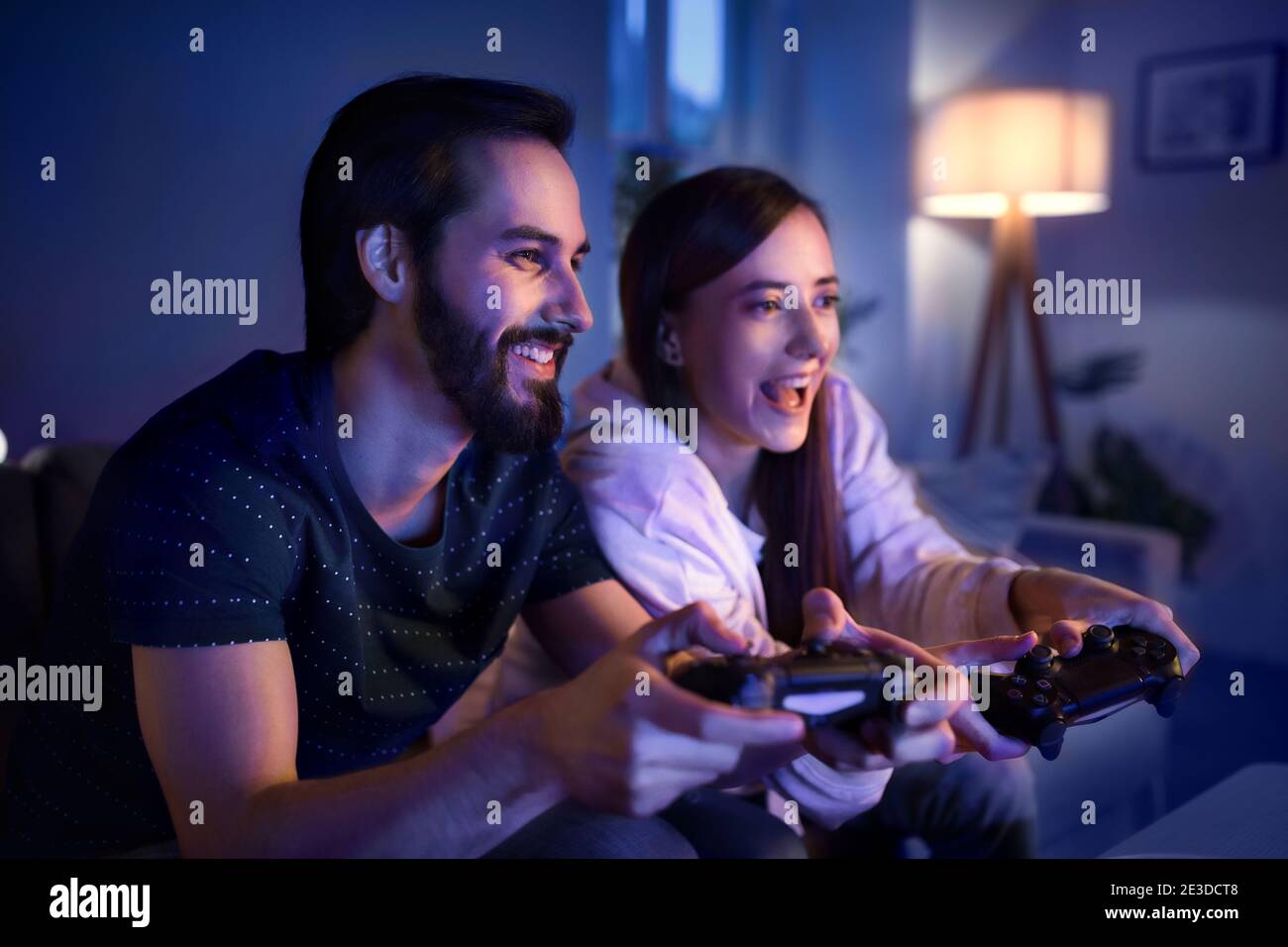Couple playing computer games hi-res stock photography and images - Alamy