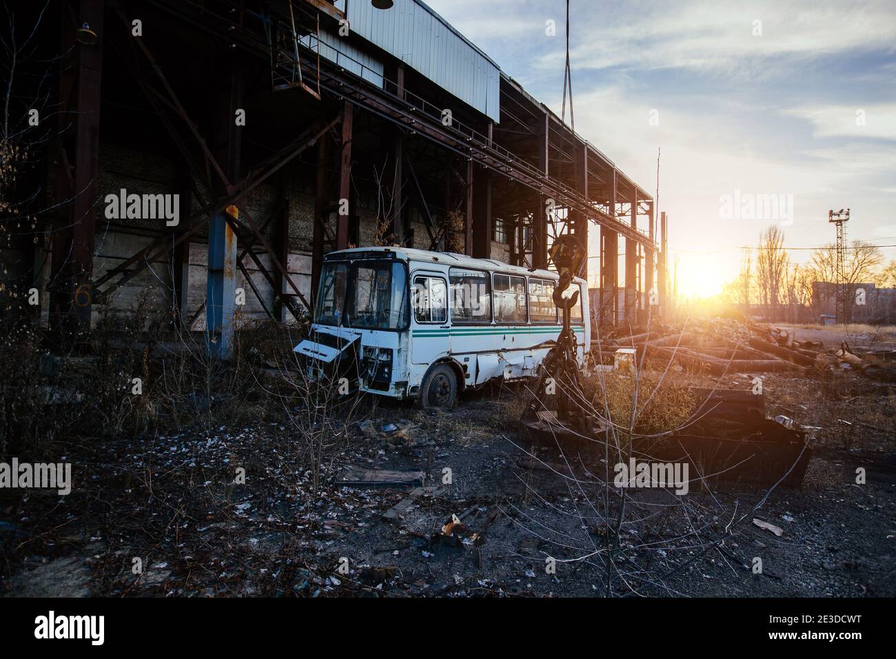 Old broken bus at abandoned industrial area Stock Photo - Alamy
