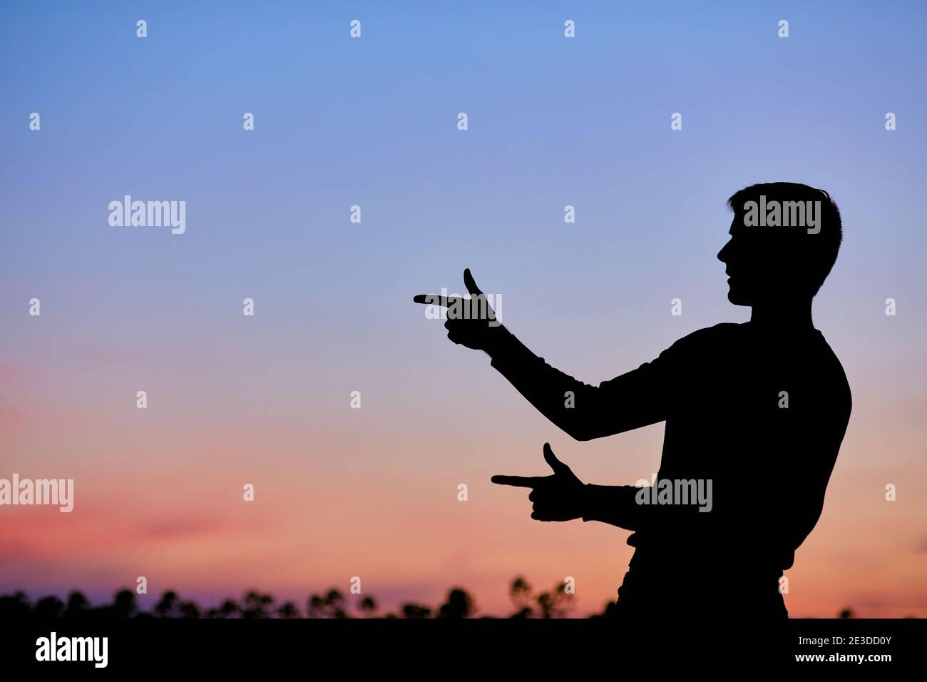 Men silhouette at sunset, human body over natural colorful sky ...