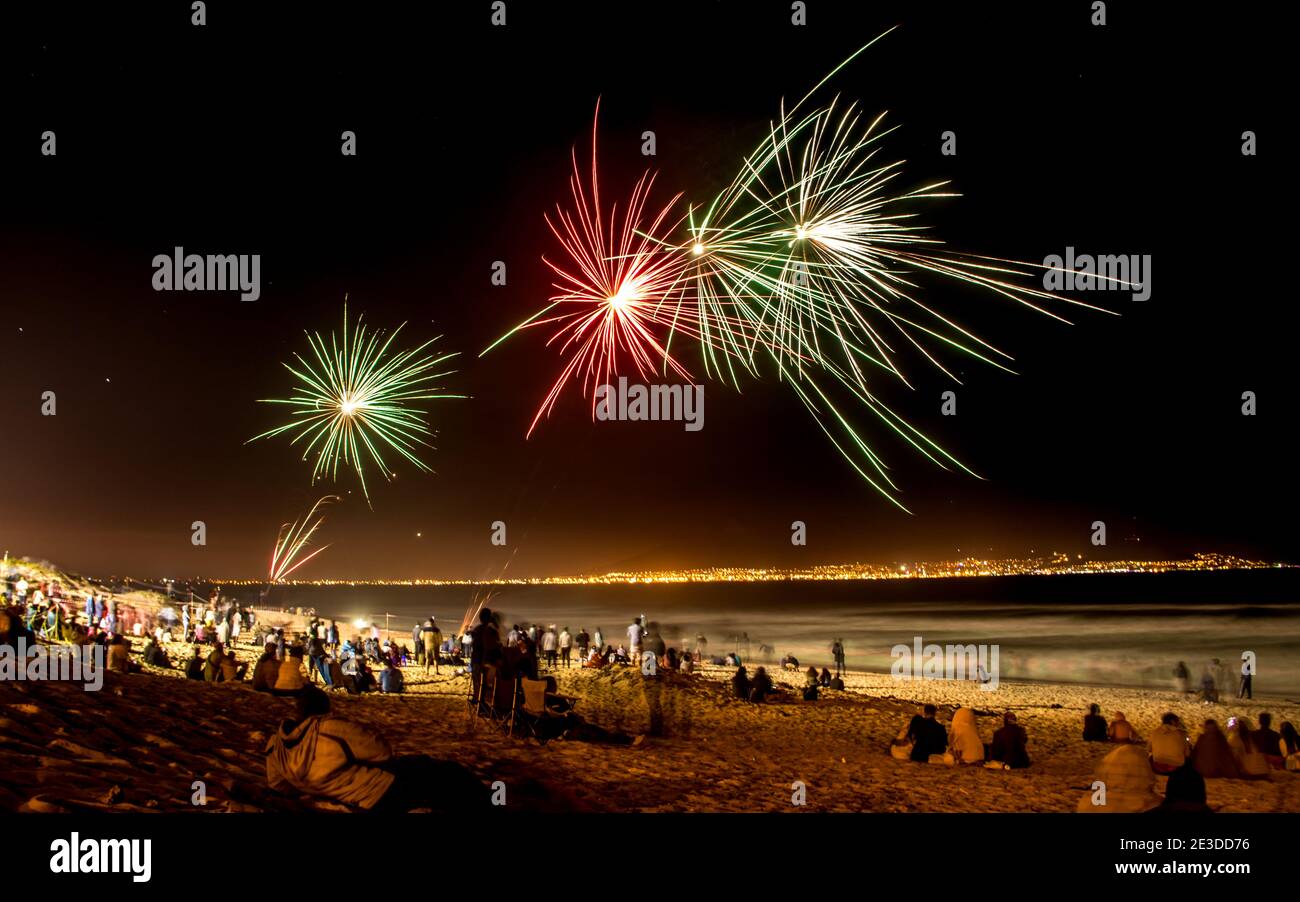 Fireworks on a beach Stock Photo - Alamy