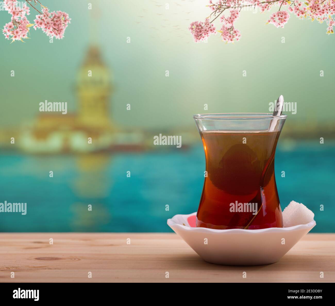 Turkish Tea on the table. Pink flowers and Maiden's Tower in the back ...