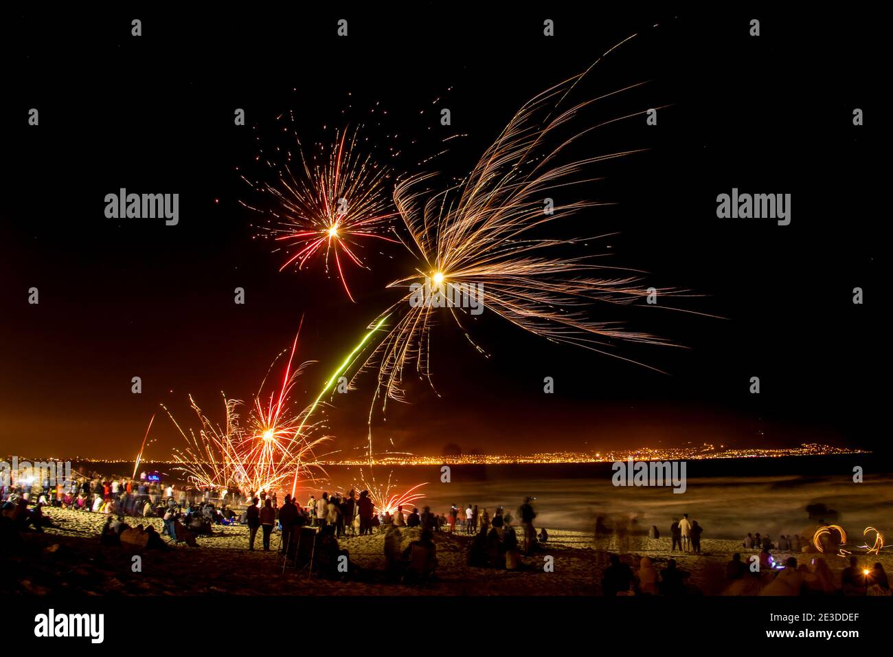 Fireworks on a beach Stock Photo - Alamy