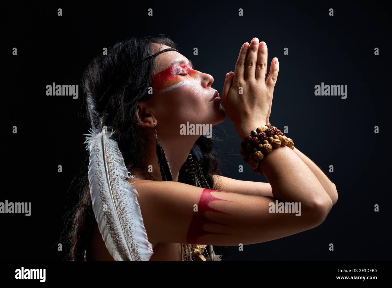 indian woman immerse herself in hypnosis, shamaning alone isolated in ...