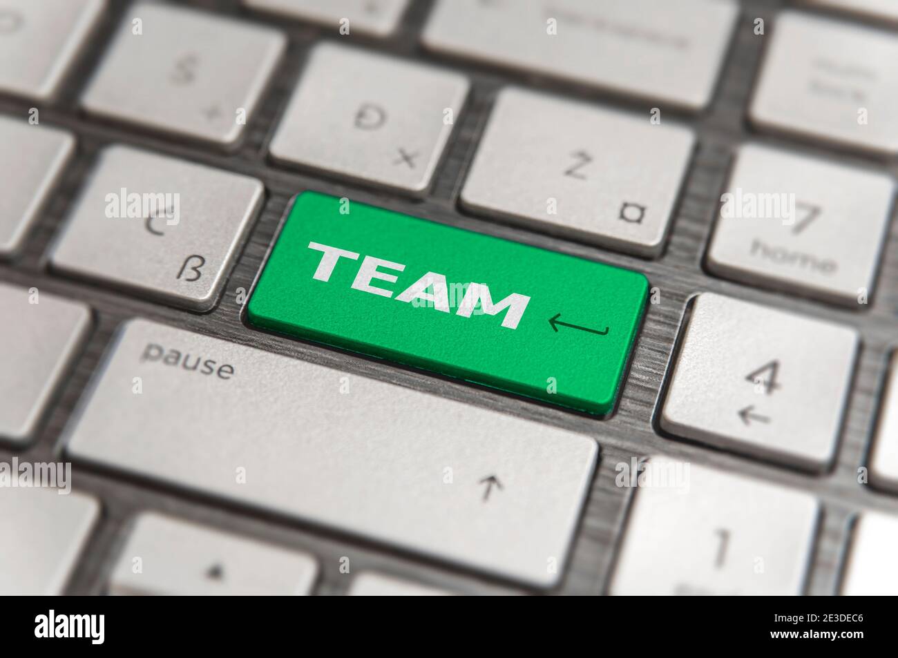 Keyboard with green key Enter and word Team button modern pc text ...