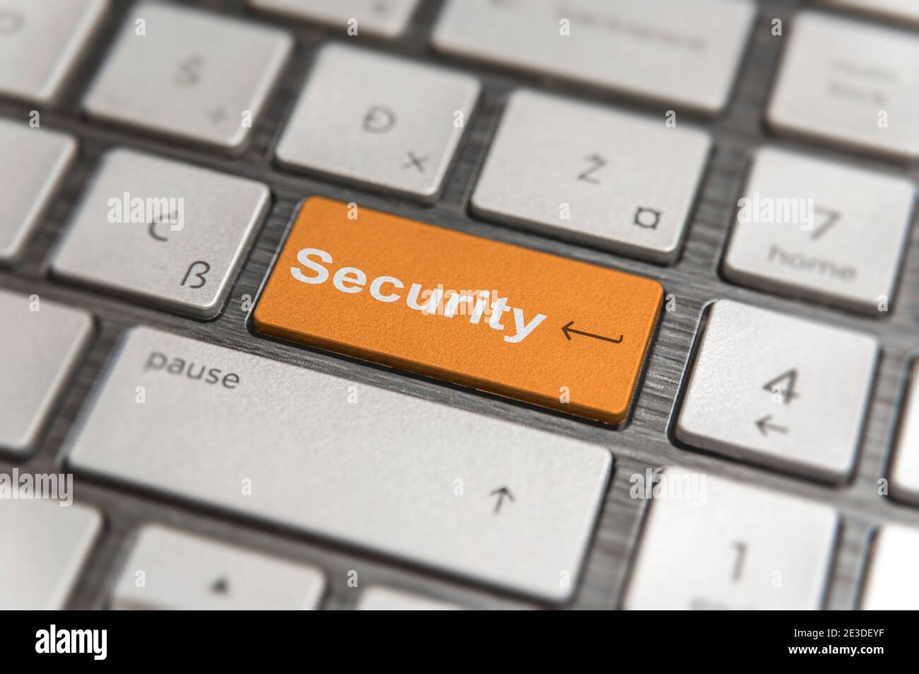 Keyboard with orange key Enter and word Security button modern pc text ...
