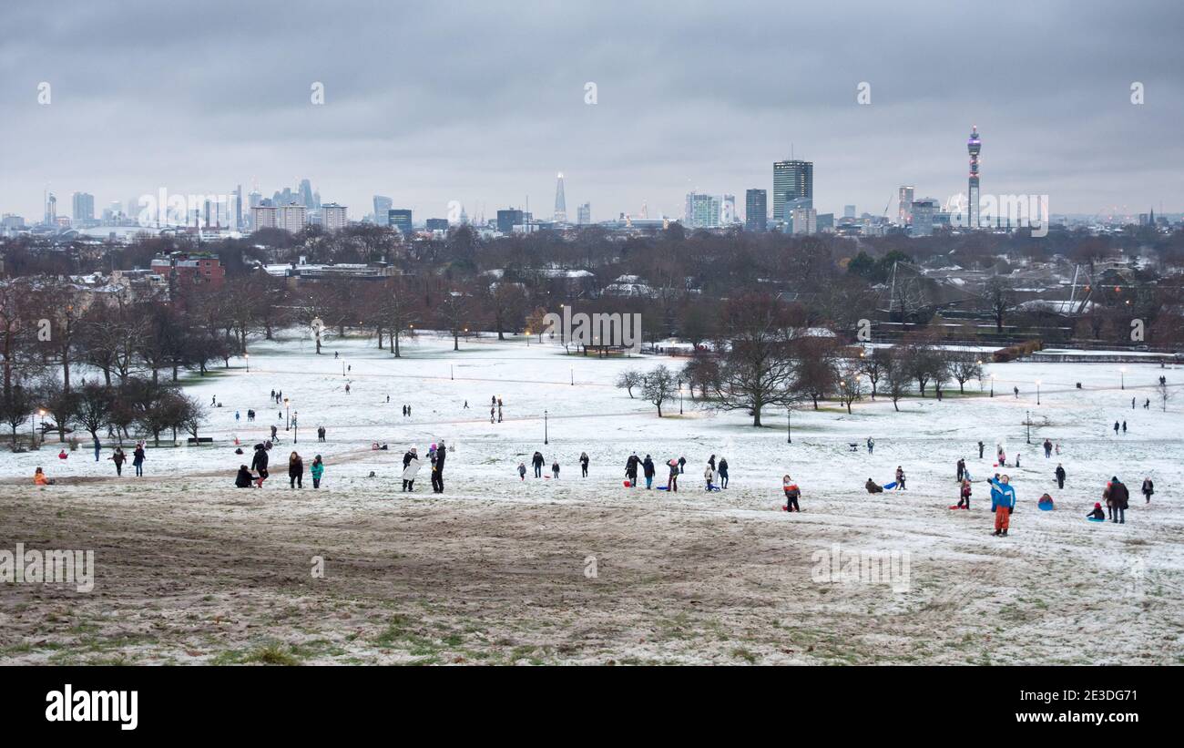London, England, UK - December 10, 2017: Families play with sledges on ...