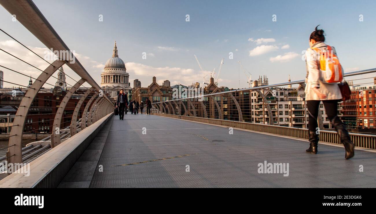 London, England, UK - April 20, 2010: Pedestrians walk across London's ...