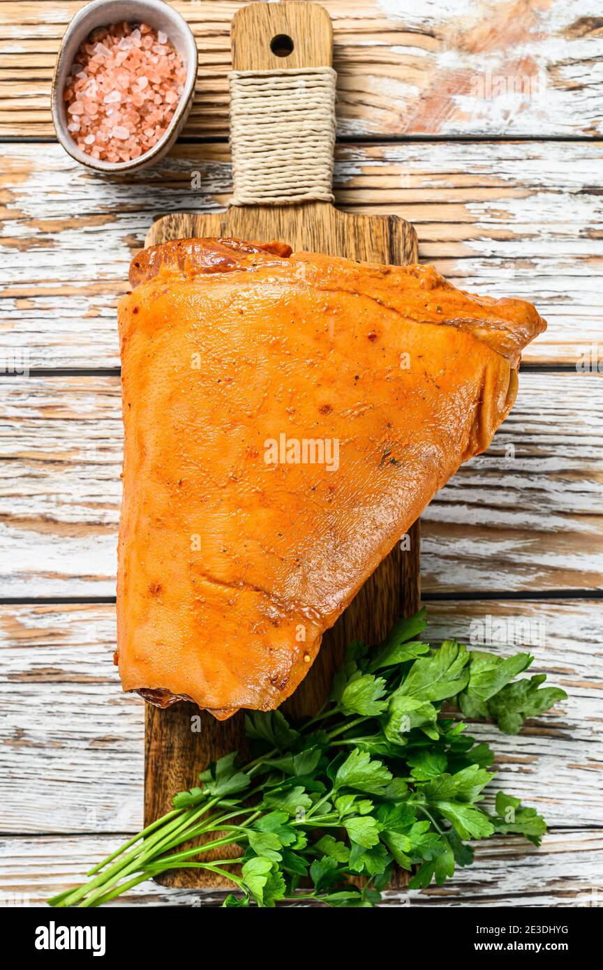 Raw fat pork knee ready for cooking. White background. Top view Stock ...