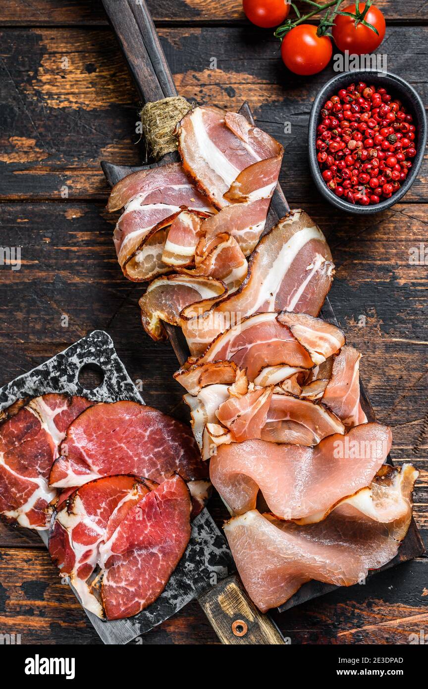 Meat antipasto board, pancetta, salami, sliced ham, sausage, prosciutto ...