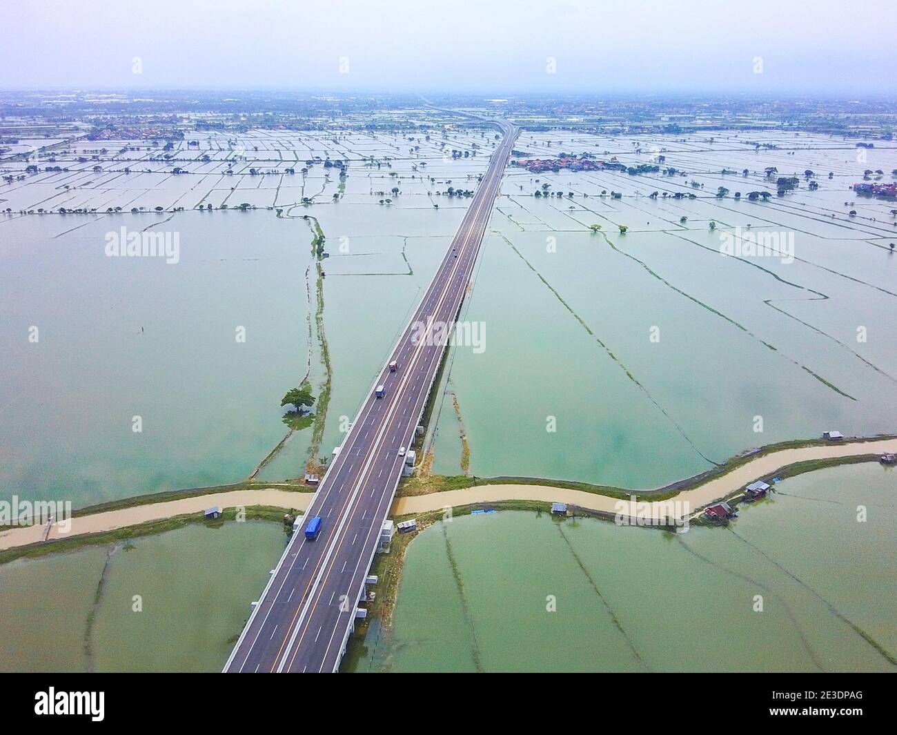 Aerial shot of a long bridge over the water with many ca Stock Photo ...