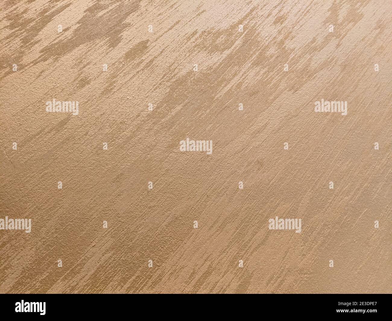 Wall painted with decorative coating of beige color Stock Photo - Alamy