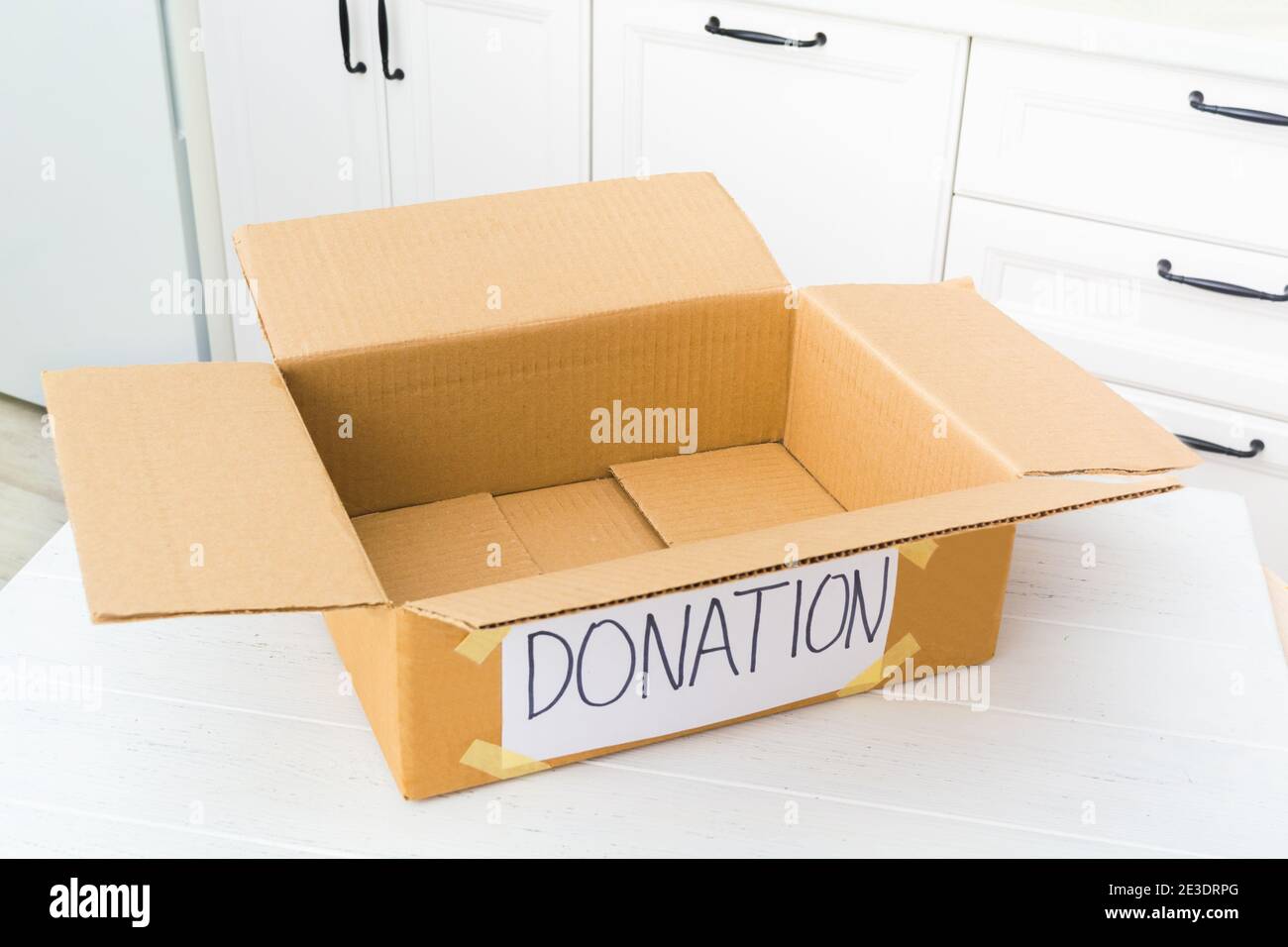 Open empty donation box with title. Help for people. Charity concept ...