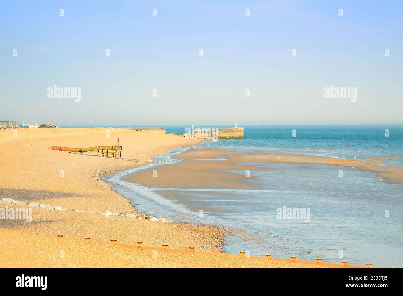 Sunny and sandy beaches of Hastings Stock Photo - Alamy