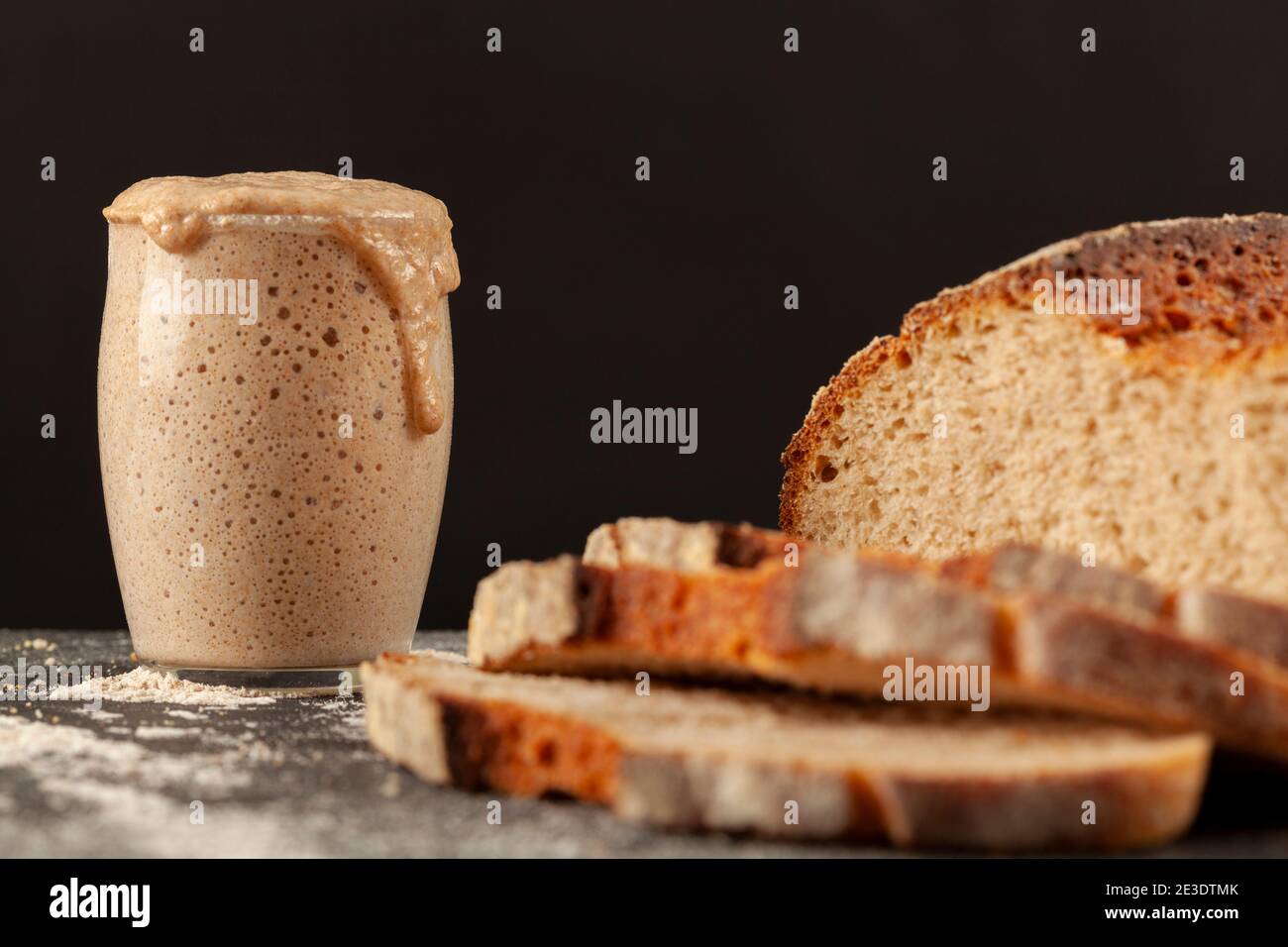 Close up side view image of a freshly baked thick crust sourdough ...