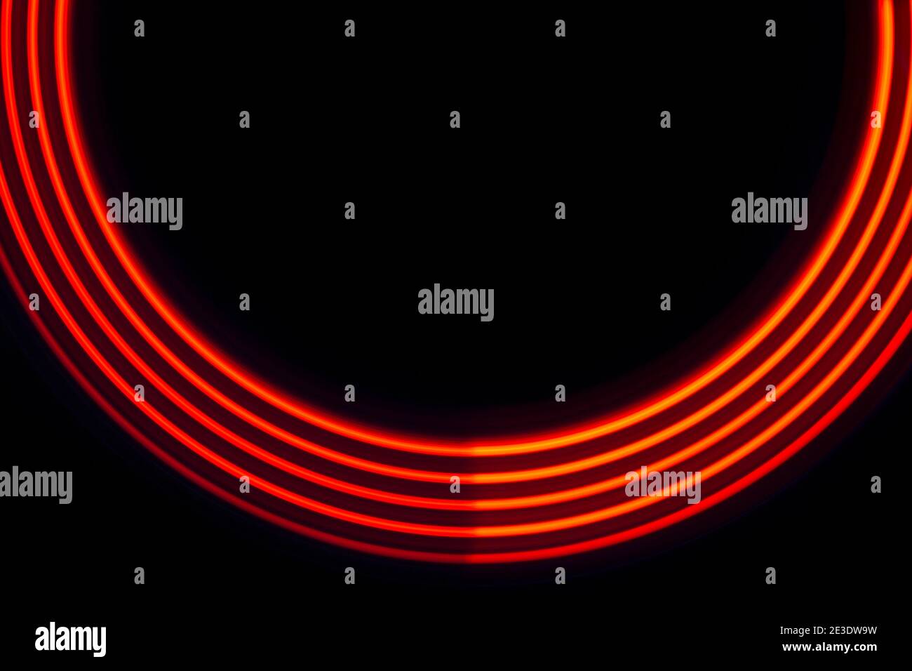 red light circles on a black background Stock Photo - Alamy