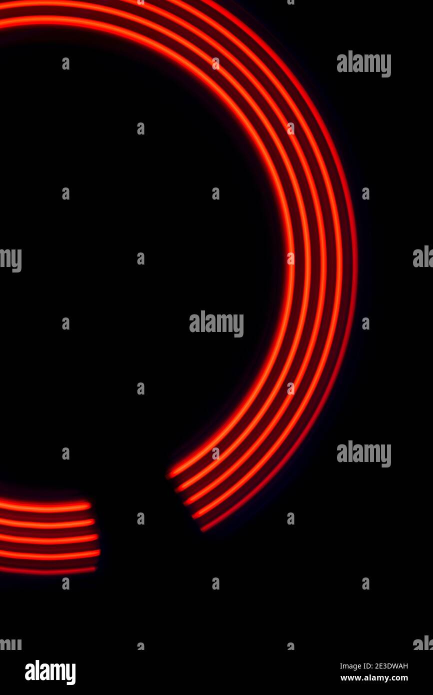 red light circles on a black background Stock Photo - Alamy