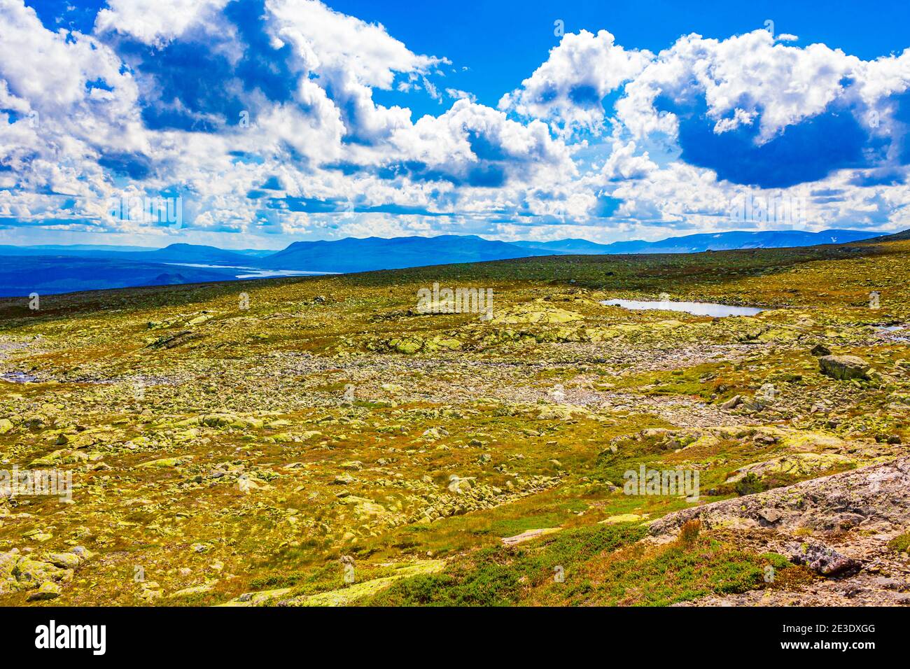 Amazing norwegian landscape with Boulders and lake at the summit on the ...