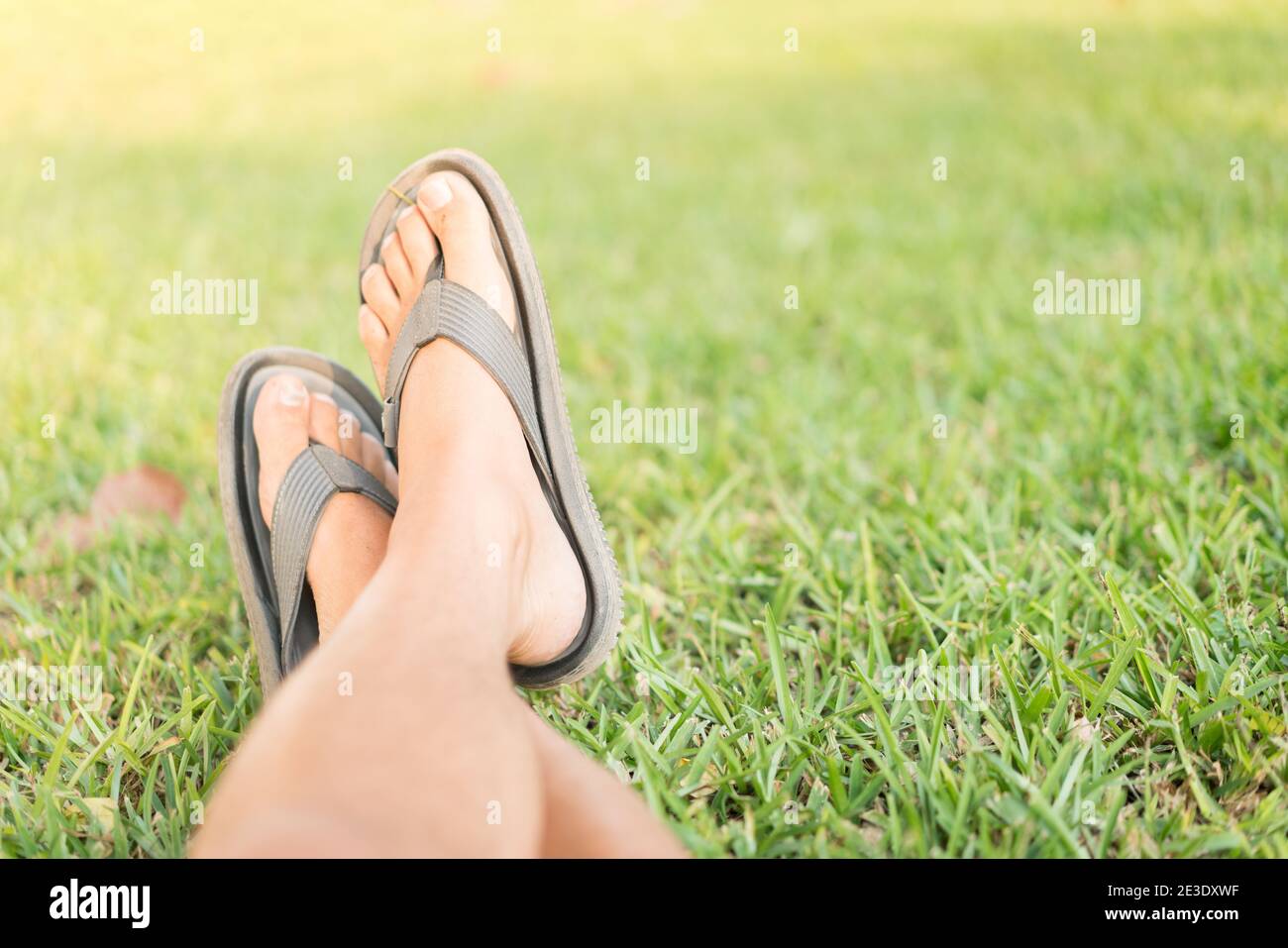 Man point of view feet on grass Stock Photo - Alamy