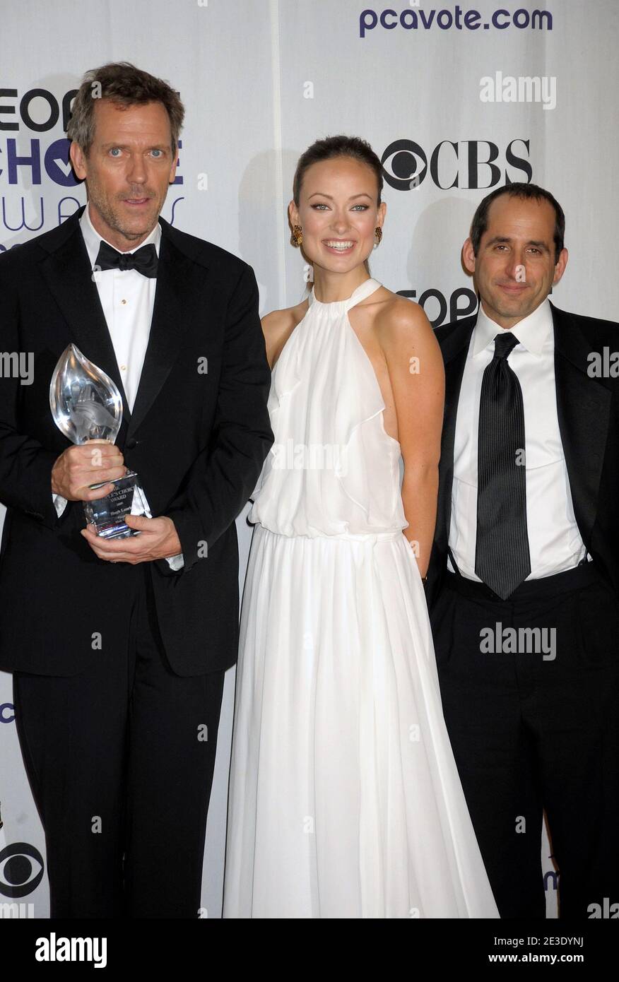 Hugh Laurie, Olivia Wilde and Peter Jacobson in the press room during ...