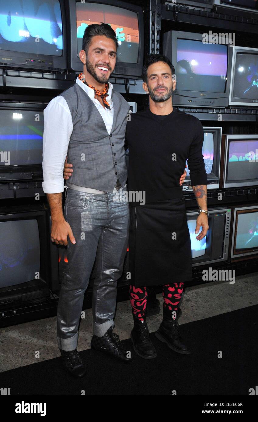 Designer Marc Jacobs (R) and boyfriend Lorenzo Martone attend the Louis ...