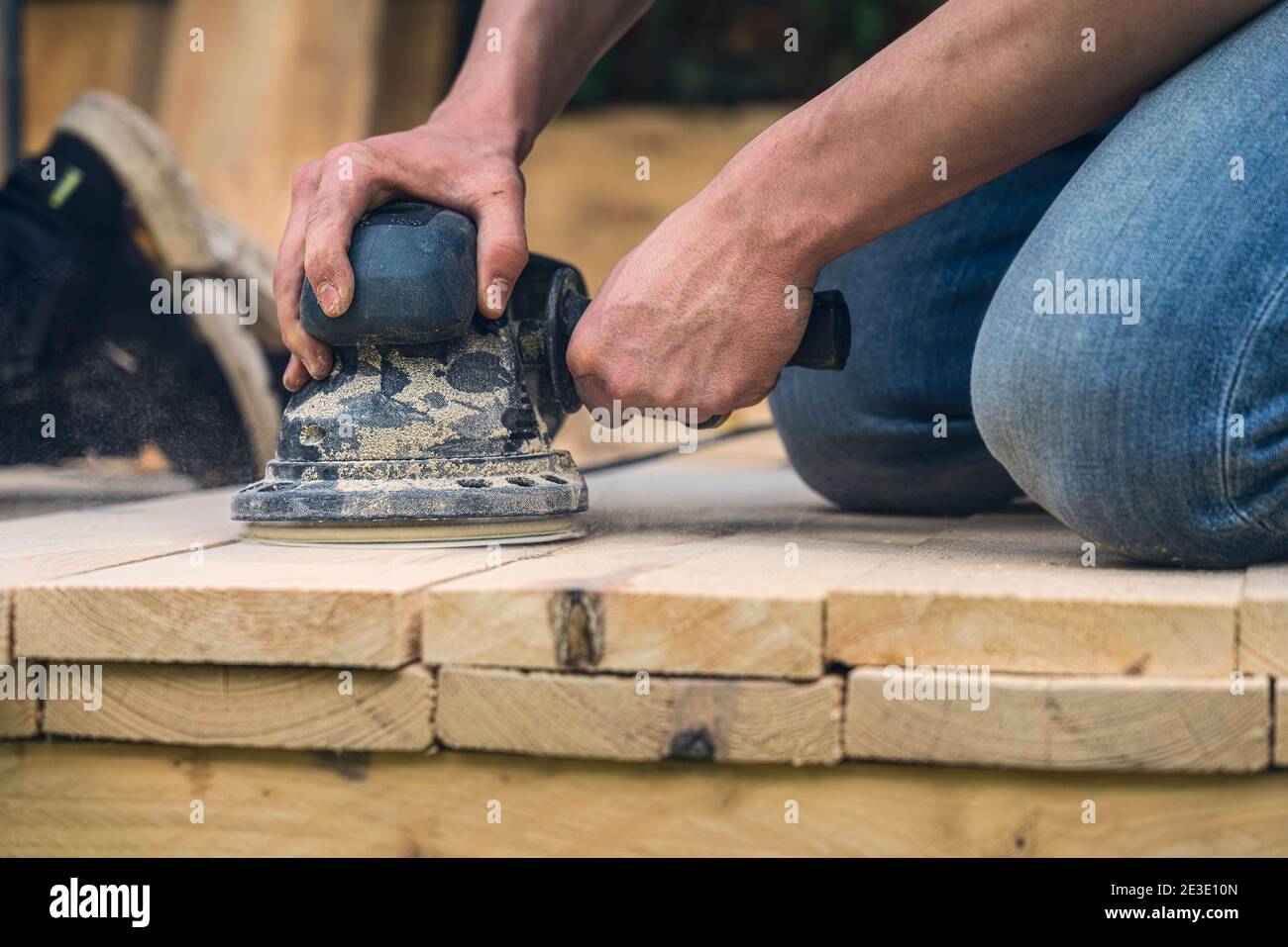 Worker sanding hi-res stock photography and images - Alamy