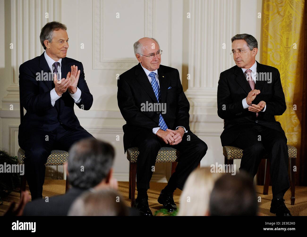 (L-R) Former prime ministers Tony Blair of the United Kingdom and John Howard of Australia, and ...