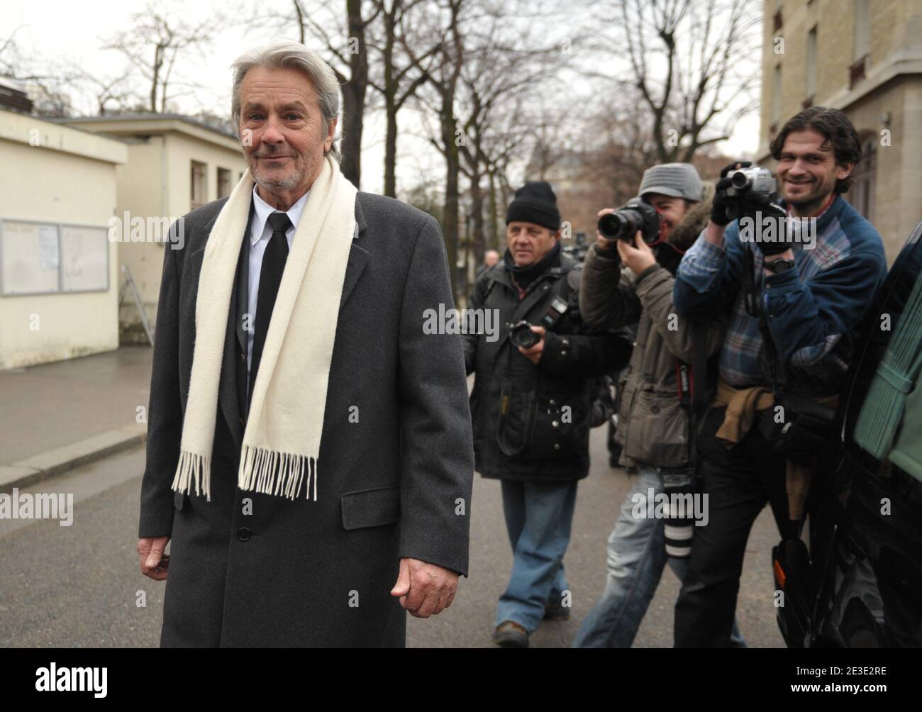Alain Delon attending the funeral of Georges Cravenne who died aged 94 ...