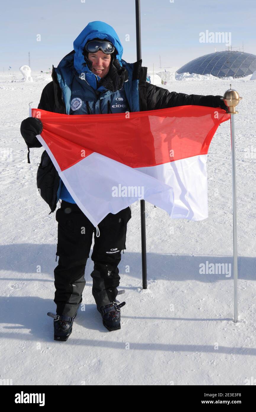 Prince Albert II of Monaco is pictured with the Monegasque flag at the ...
