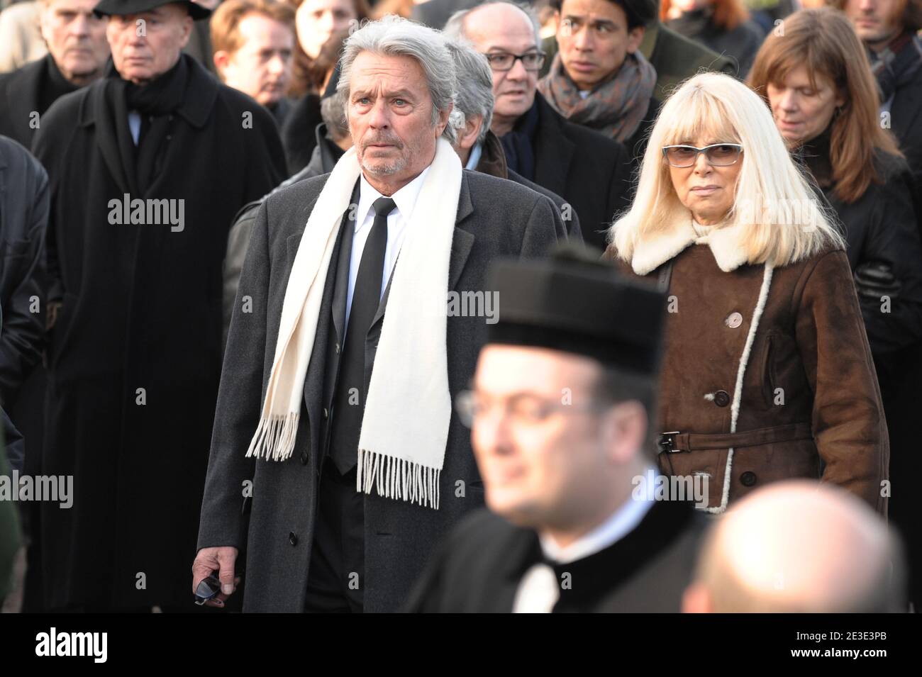 Alain Delon and Mireille Darc attending the funeral ceremony of French ...