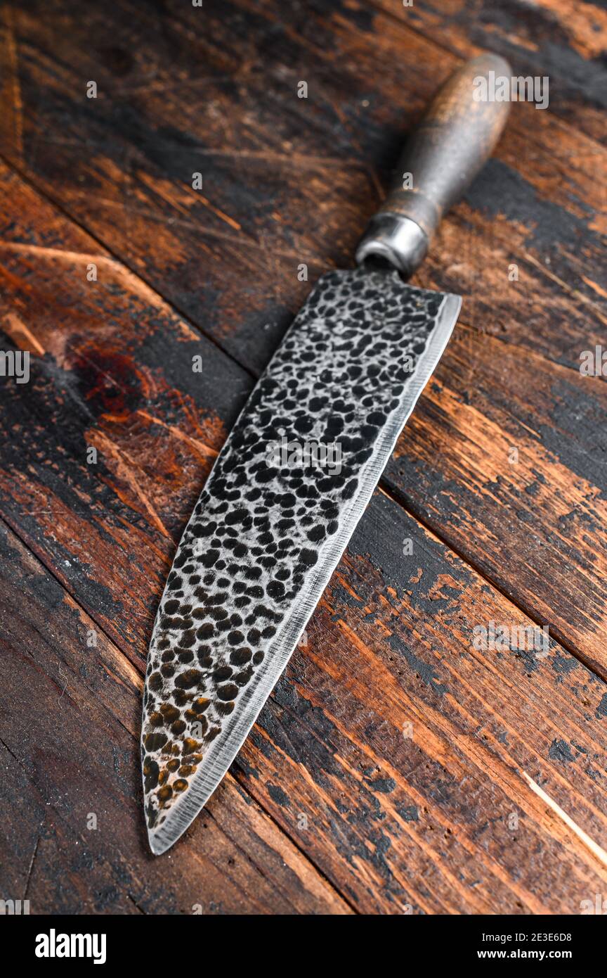 Vintage butcher meat knife. Dark wooden background. Top view Stock ...